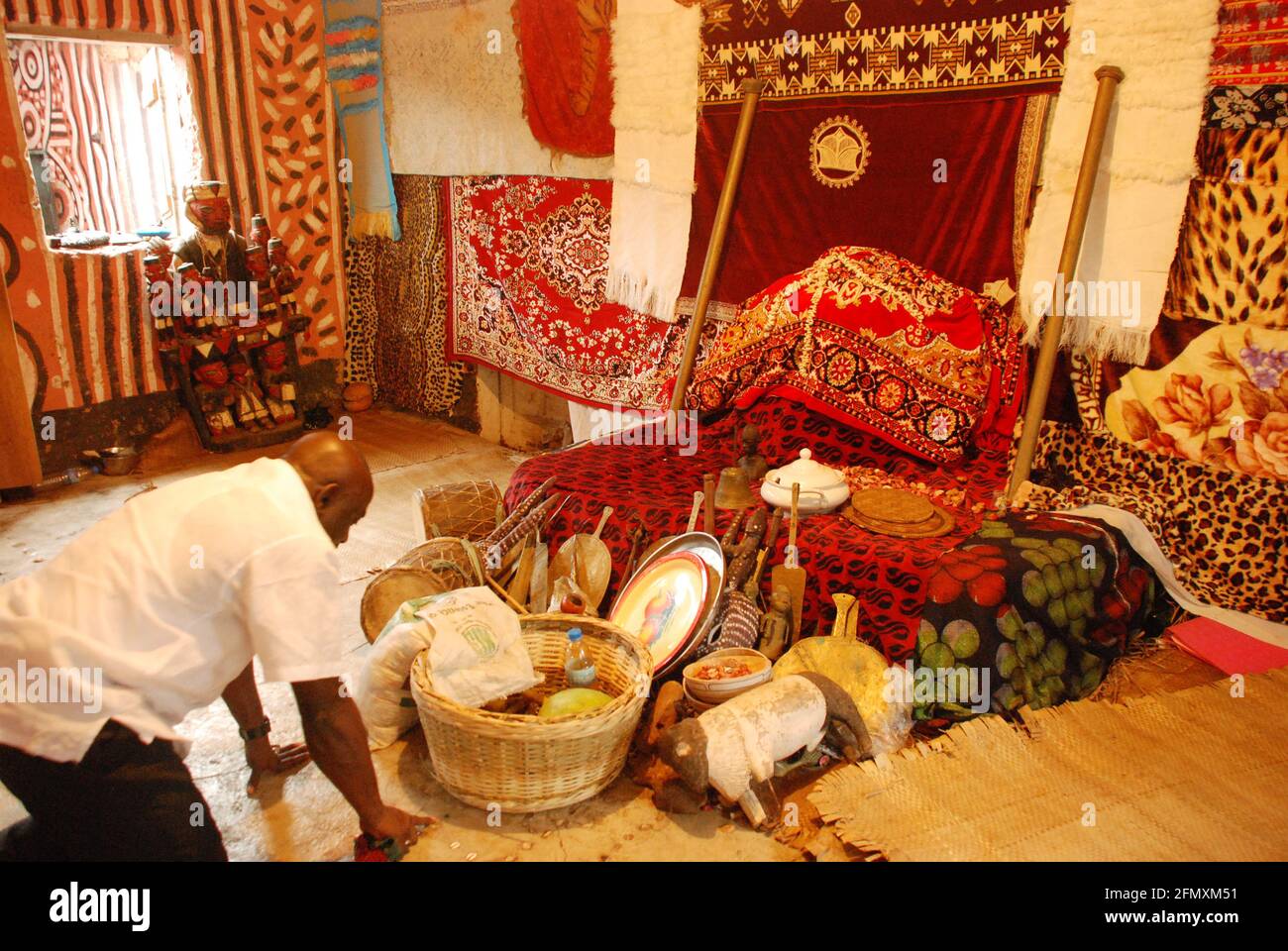Osun Osogbo Shrine: Man praying at the shrine Stock Photo - Alamy