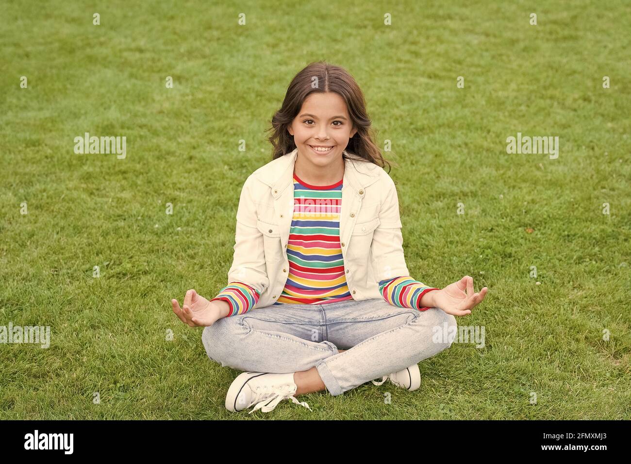 Peace of mind. School break for rest. Adorable pupil. Girl kid sit on ...
