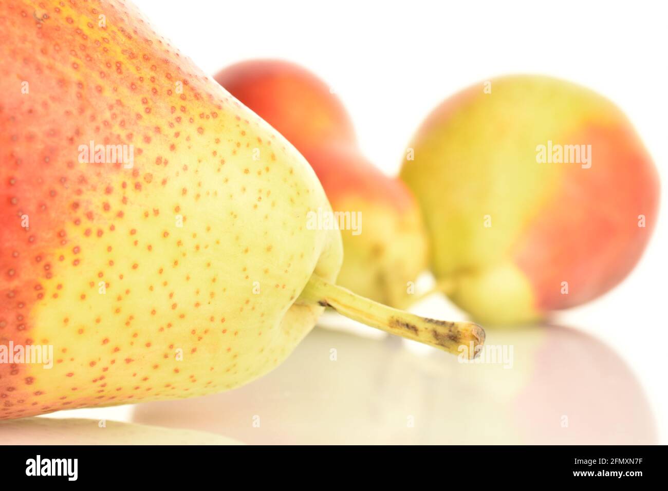 Three whole ripe pears, close-up, on a white background Stock Photo - Alamy