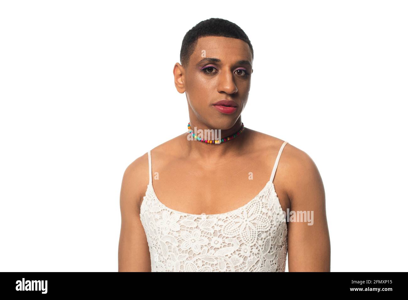 african american transgender man in sundress and makeup looking at ...