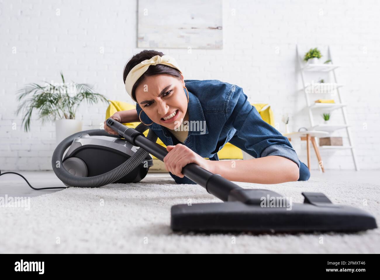 Angry housewife vacuum hi-res stock photography and images - Alamy