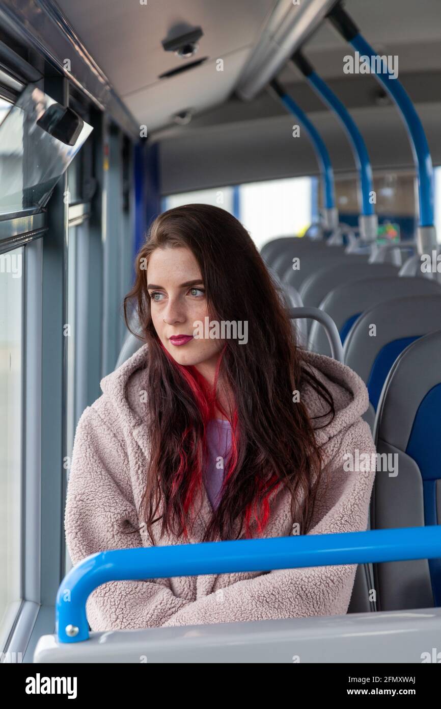 Woman sitting bus window bus hi-res stock photography and images - Alamy