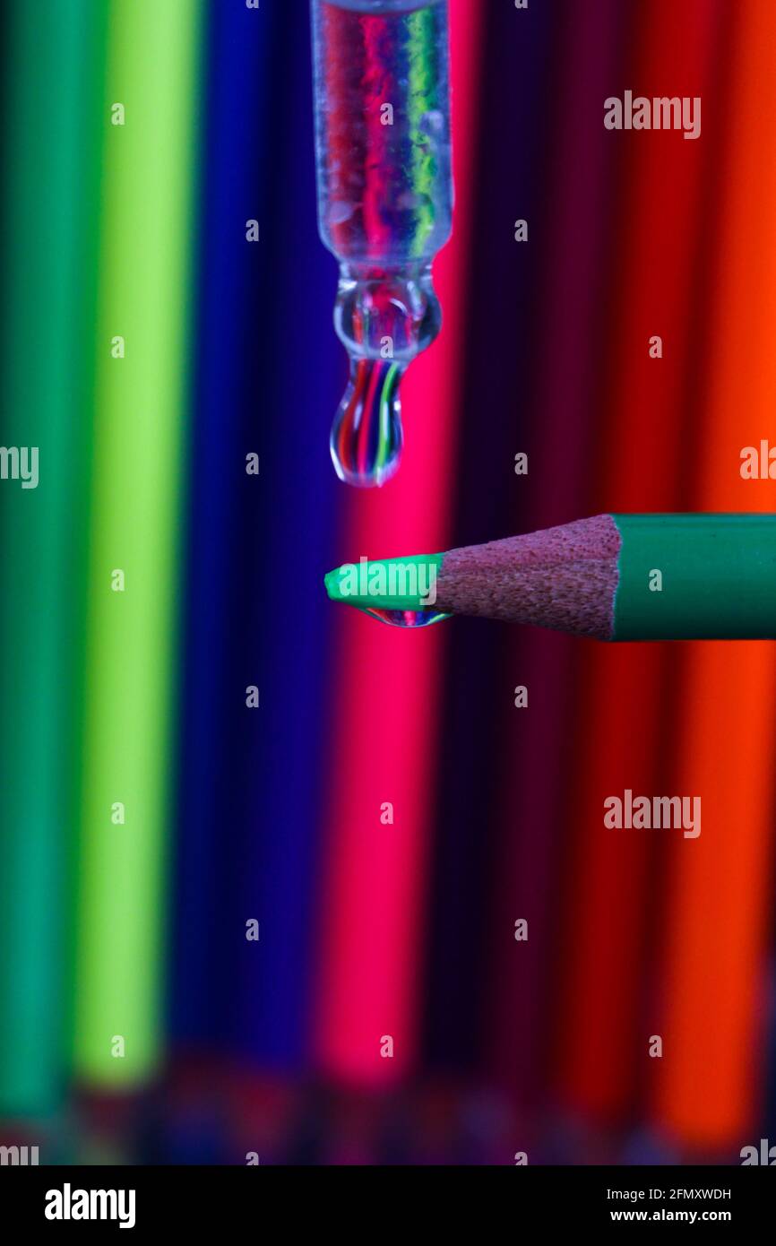 water drop onto crayon Stock Photo - Alamy