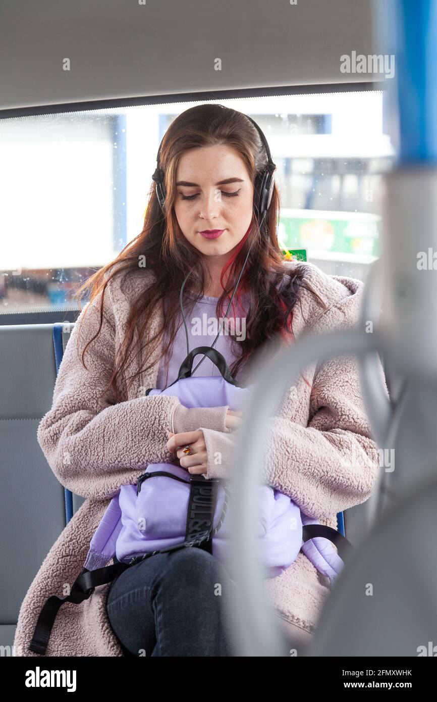Woman getting on bus hi-res stock photography and images - Alamy