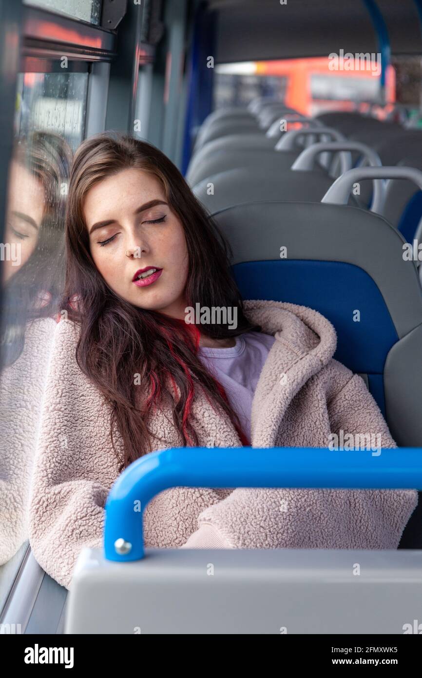Woman exhaustion public transport hi-res stock photography and images ...