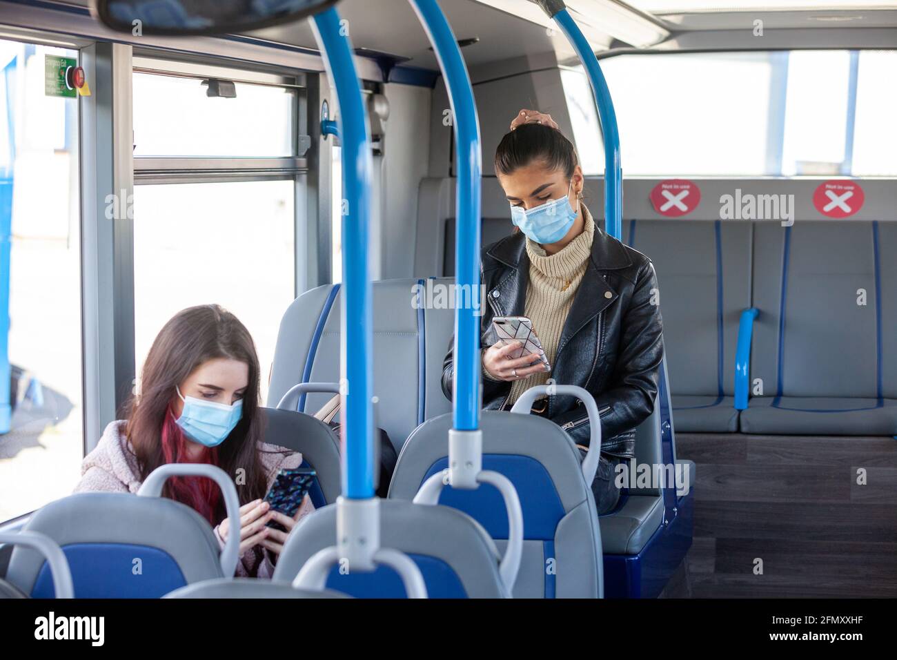 Passengers travelling on a bus hi-res stock photography and images - Alamy