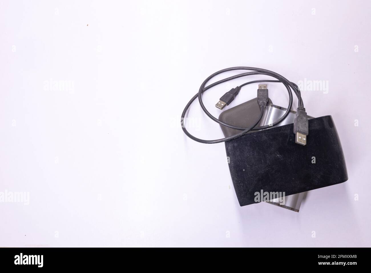 Hard discs used to store data from computer stacked together with white ...