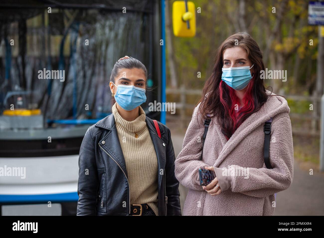 Person standing waiting for bus hi-res stock photography and images - Alamy
