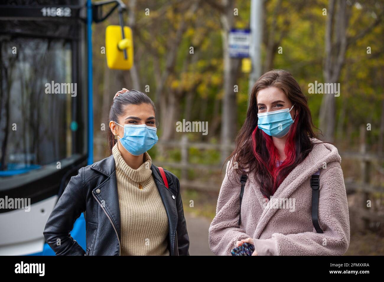 Person standing waiting for bus hi-res stock photography and images - Alamy