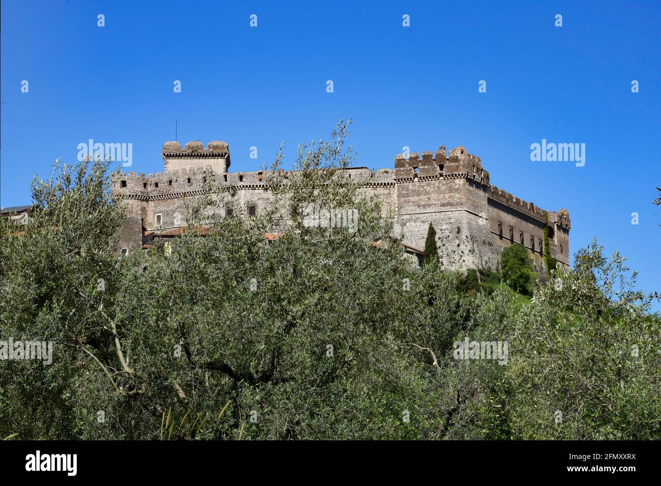 Sermoneta, Italy, 05/10/2021. A castle among olive trees in a medieval ...