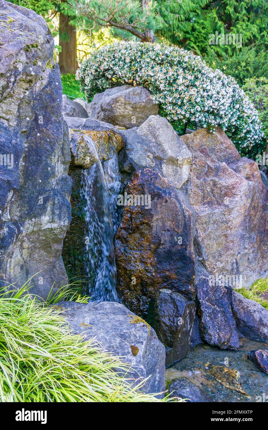 Water falls of a solid rock face in Seatac, Washington Stock Photo - Alamy