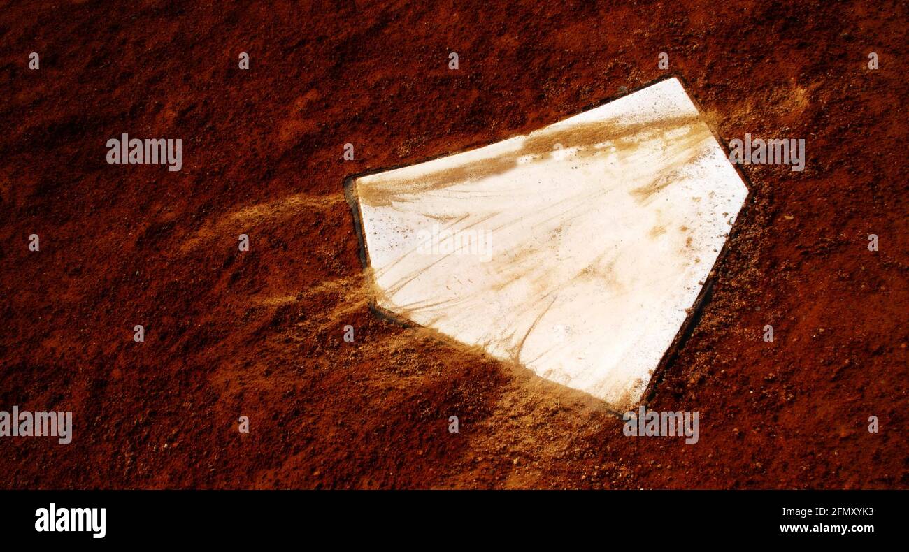 Home plate on baseball field with copy space raked dirt for America's ...