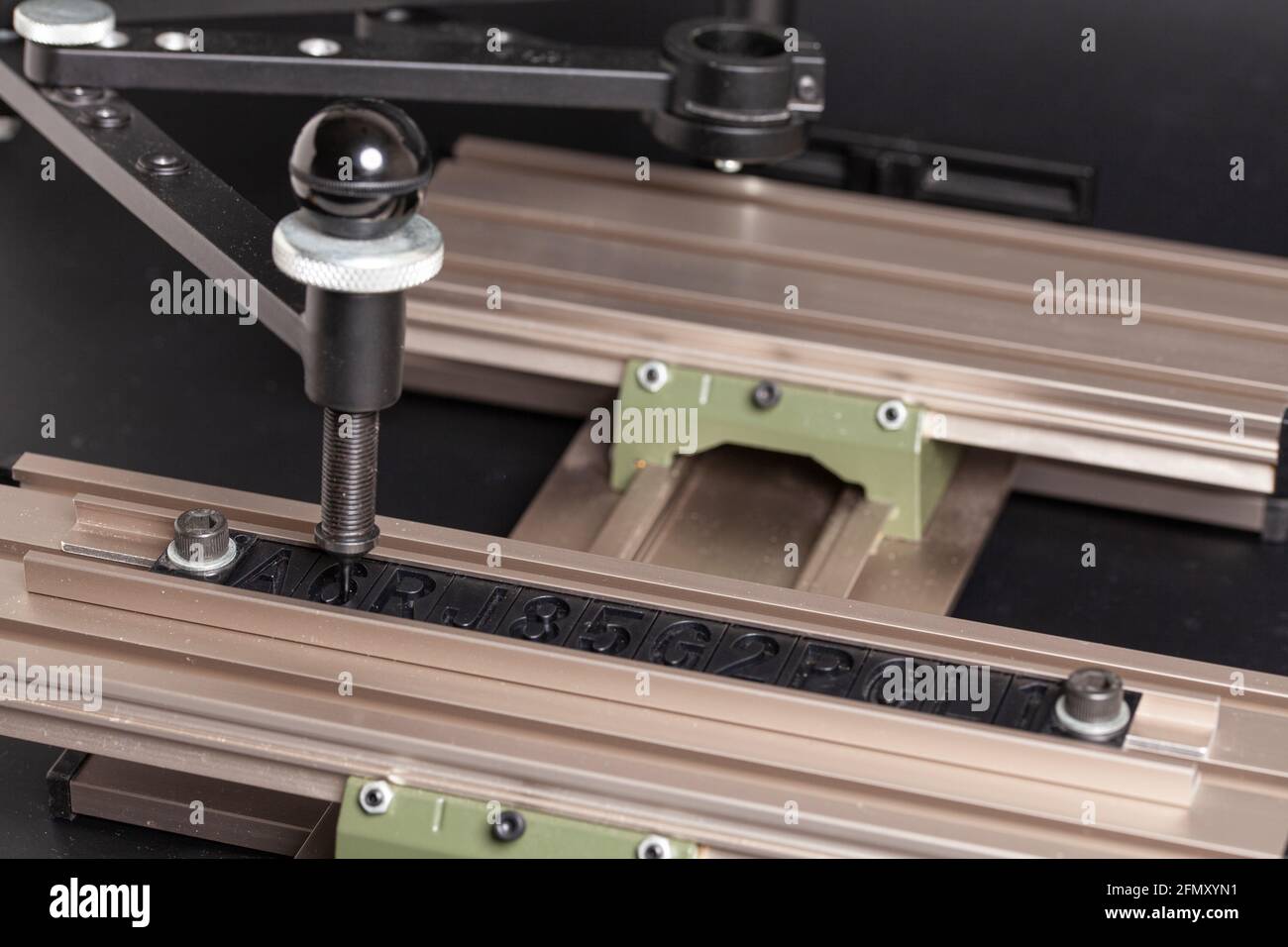 Engraving device pantograph with letterpress alphabet Stock Photo - Alamy