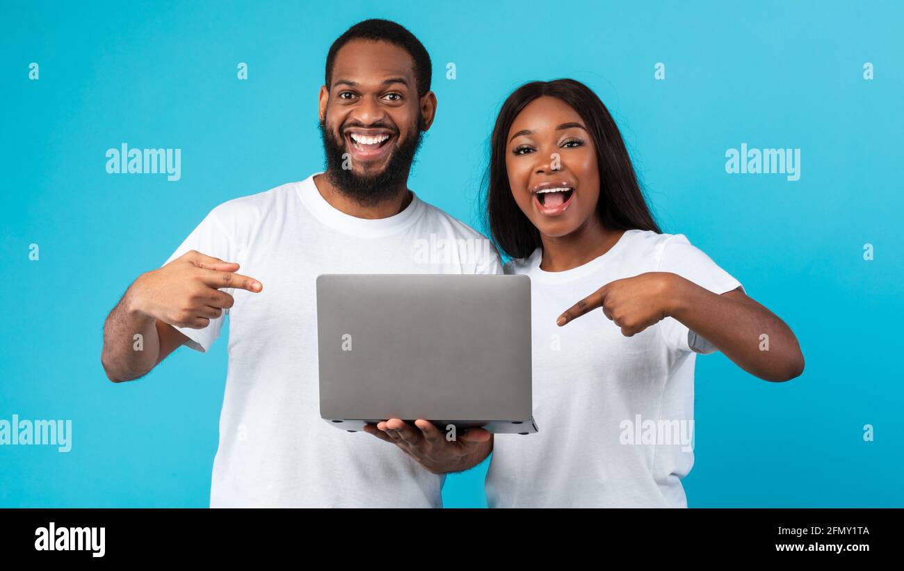 Enthusiastic black man pointing hi-res stock photography and images - Alamy