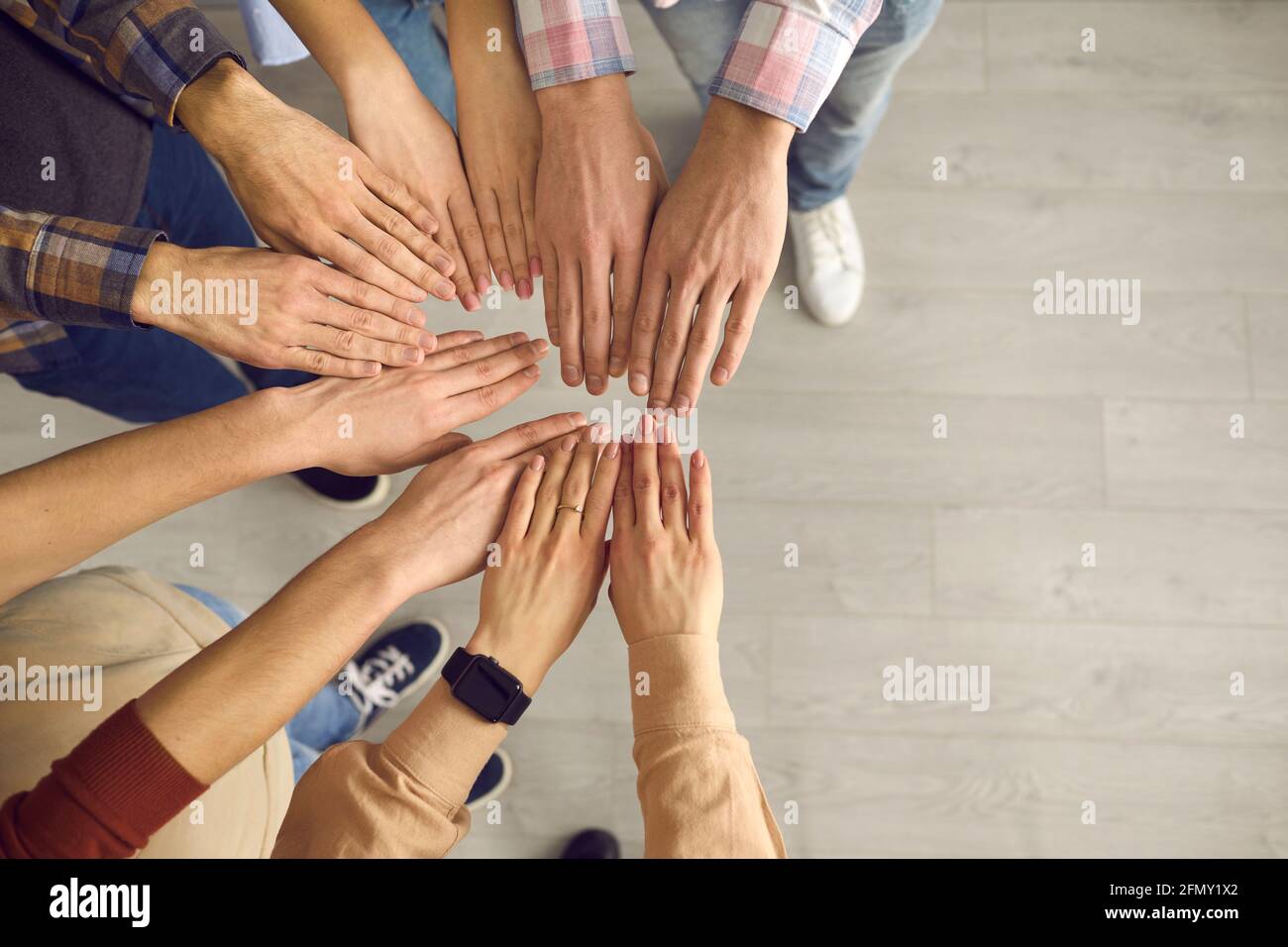 Business people team worker group holding hands palm together top view ...
