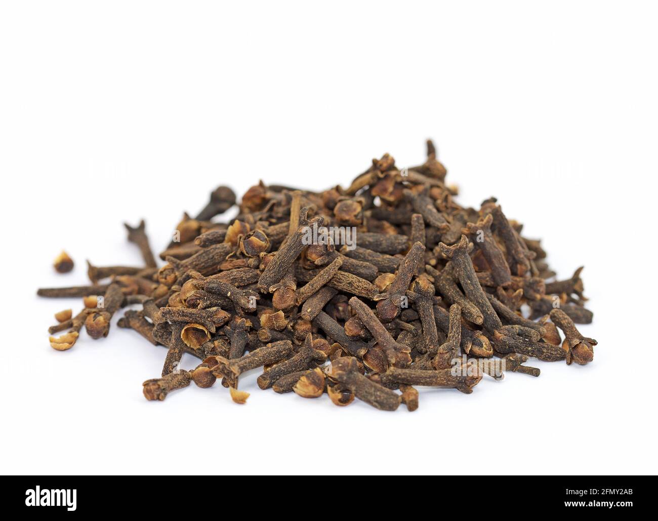 Cloves against a white background Stock Photo - Alamy