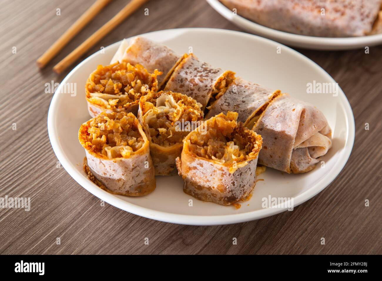 Chinese traditional popiah with vegetables. Popular Chinese fresh ...