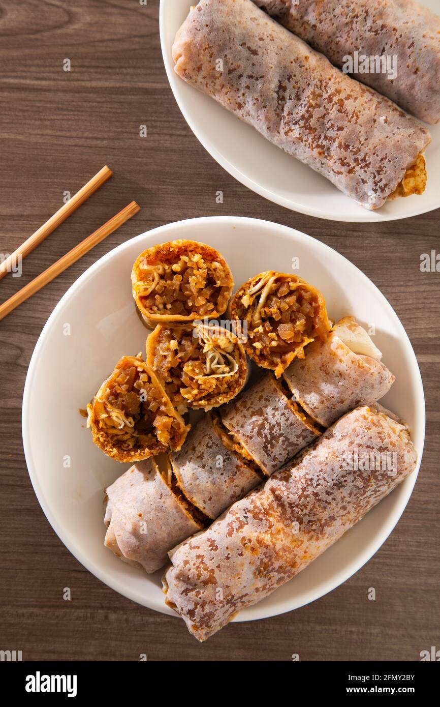 Chinese traditional popiah with vegetables. Popular Chinese fresh ...