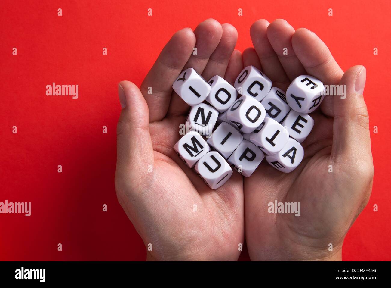 Learn words on red background. Education concept Stock Photo - Alamy