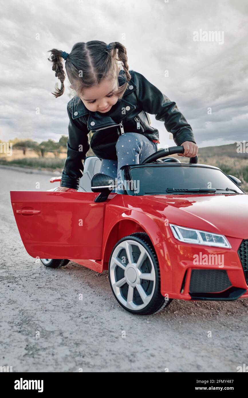 Girl race car toy hi-res stock photography and images - Alamy