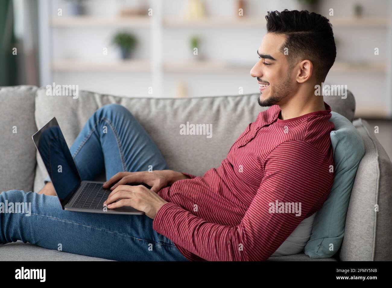 Middle eastern guy using laptop hi-res stock photography and images - Alamy