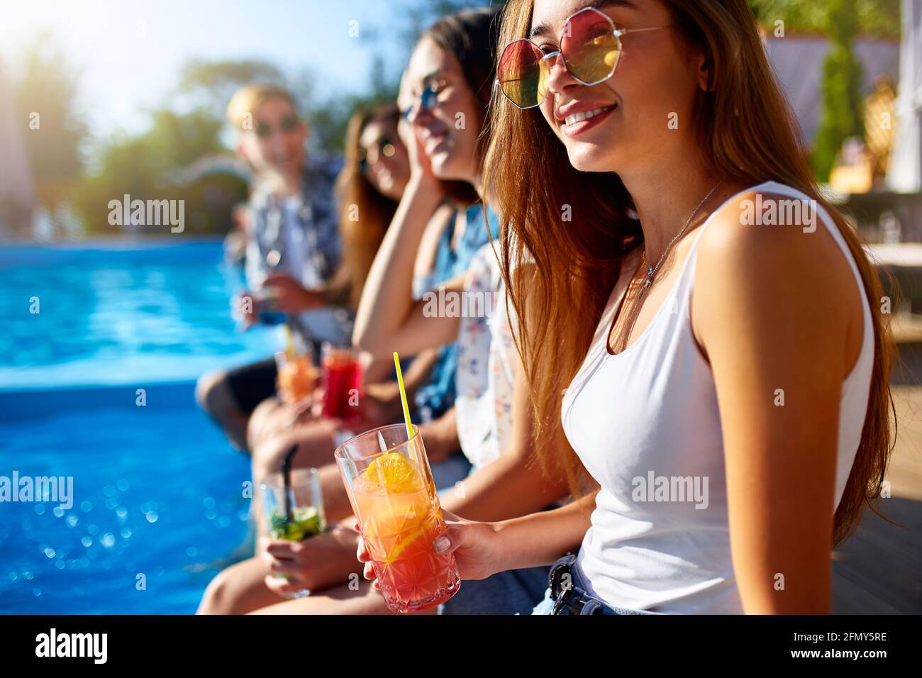 Young woman pool party hi-res stock photography and images - Alamy
