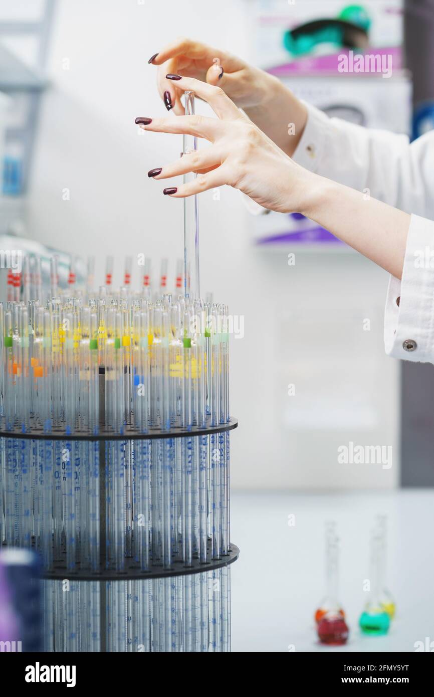 Hands of a chemical laboratory employee with test tubes close-up Stock ...