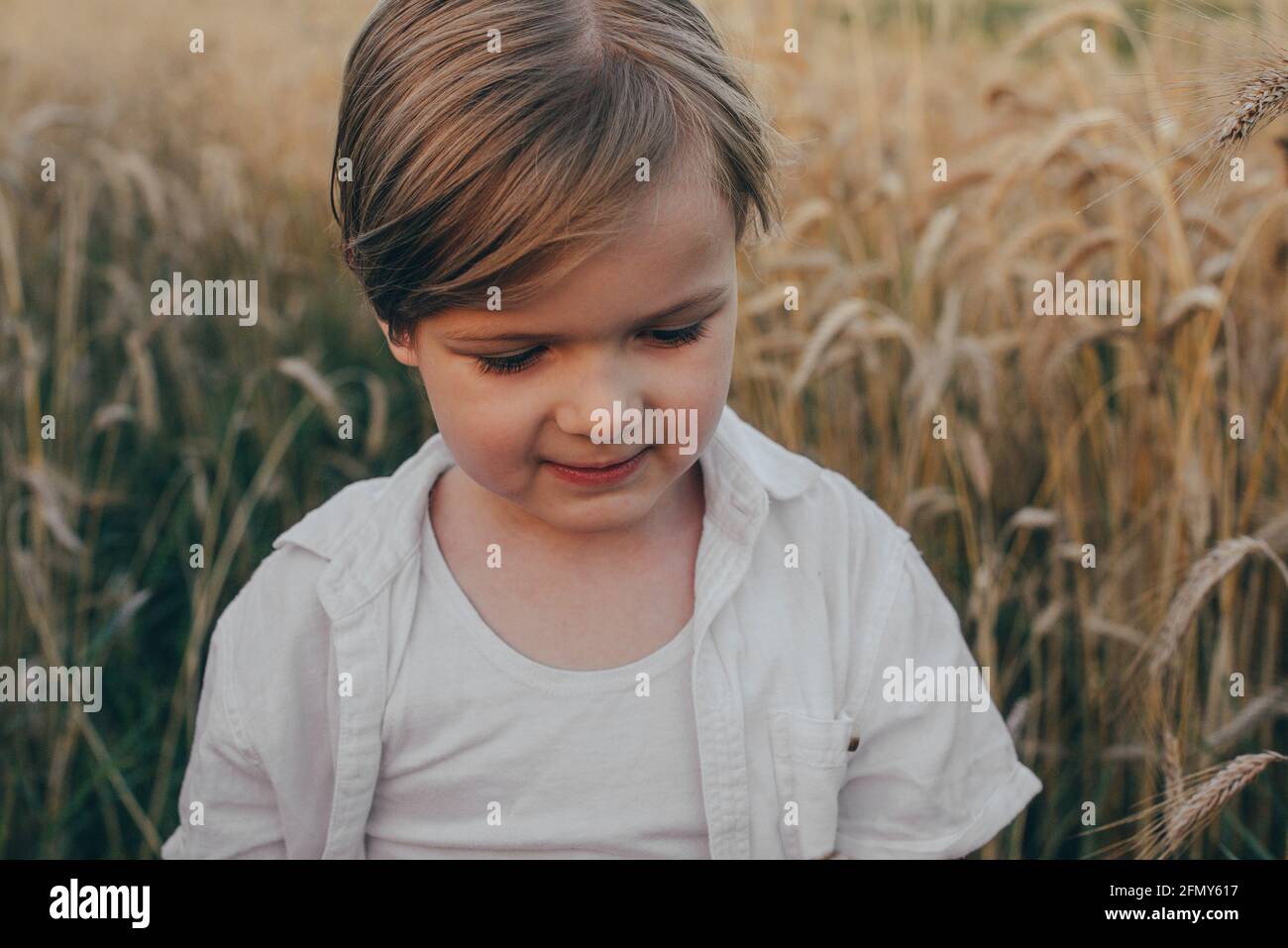 Boy wearing white shirt hi-res stock photography and images - Alamy
