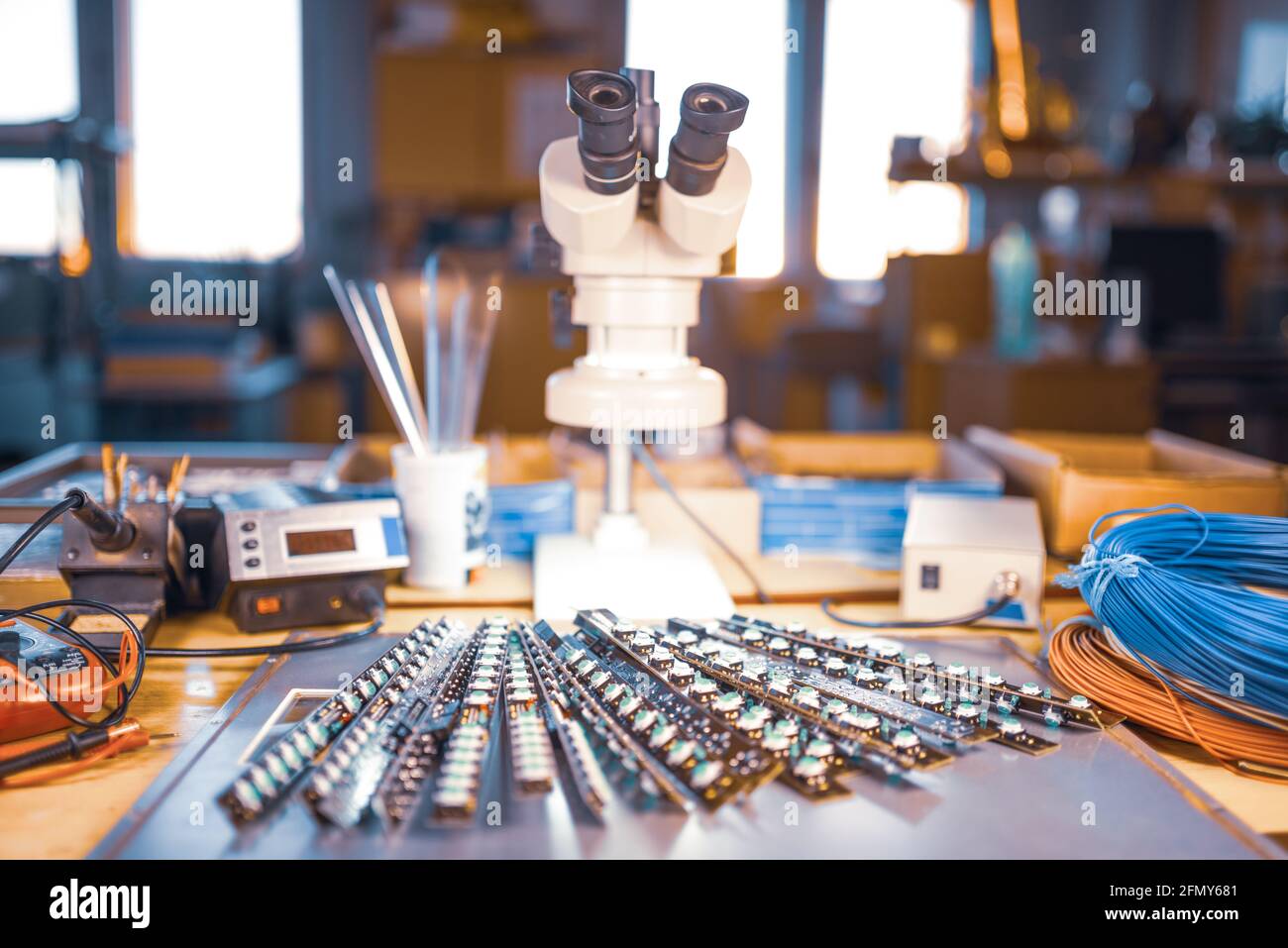 Large electron microscope and panel of LED light indicators are stacked ...