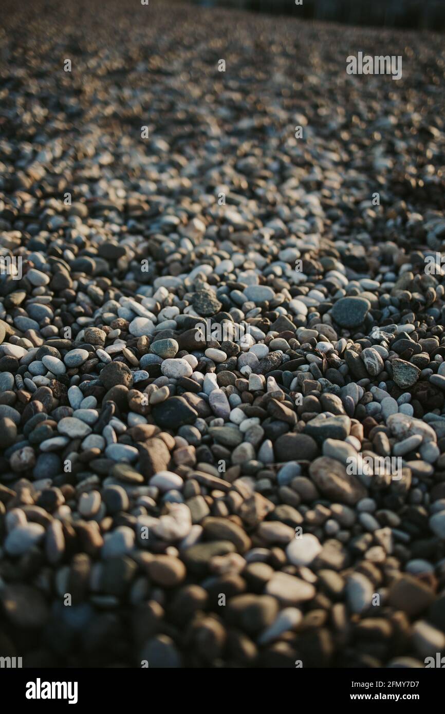 Vertical closeup shot of gray pebbles at the beach Stock Photo - Alamy