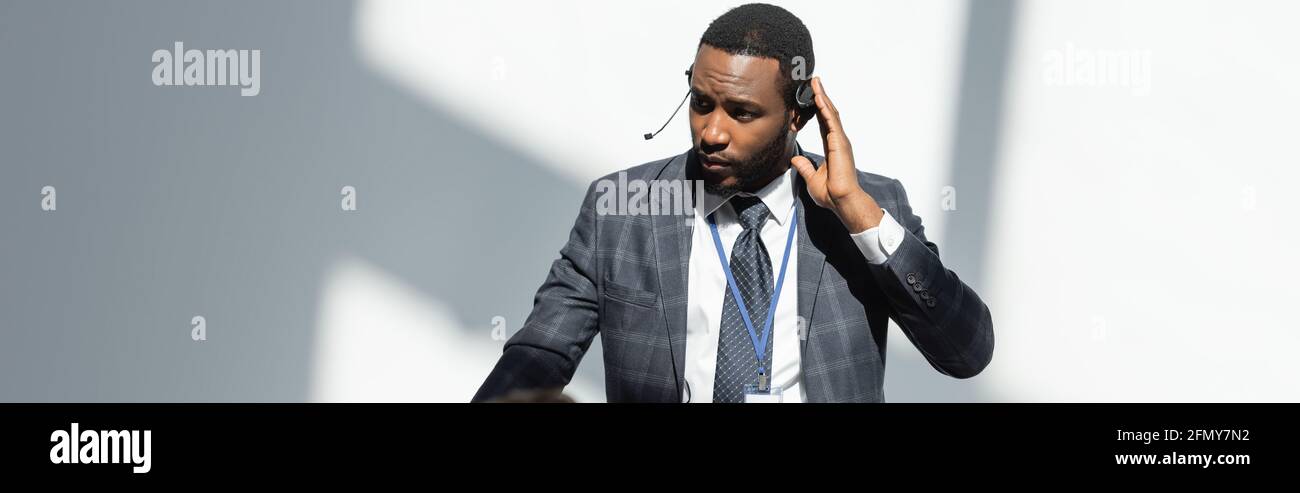 African american lecturer adjusting hi-res stock photography and images ...