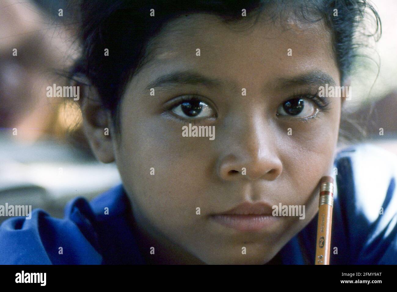 Girl with pencil Stock Photo - Alamy