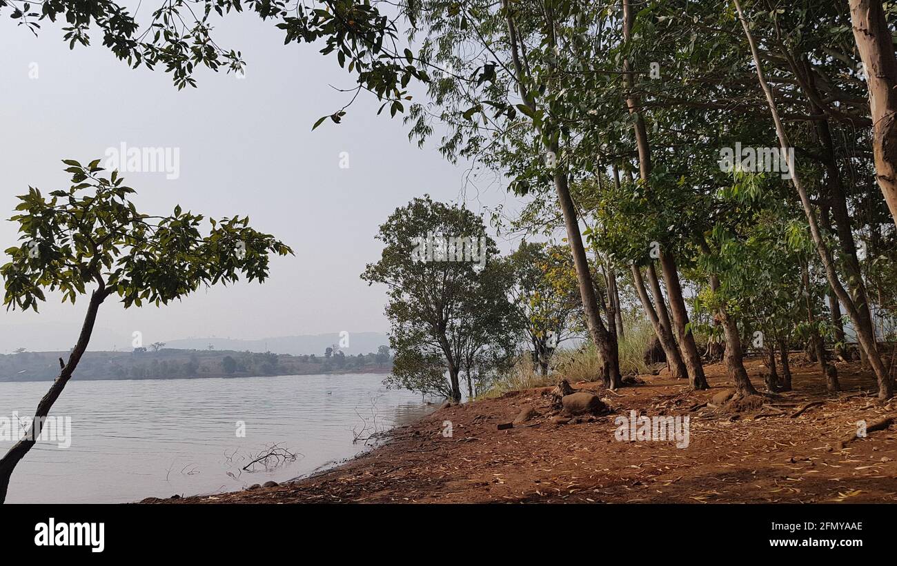 Pavana lake side view on a winter noon. Pavana lake is located in ...
