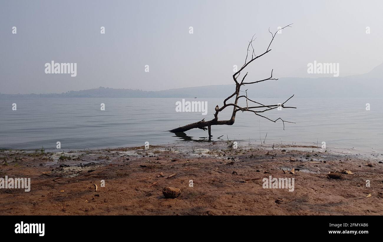 Pavana lake side view on a winter noon. Pavana lake is located in ...