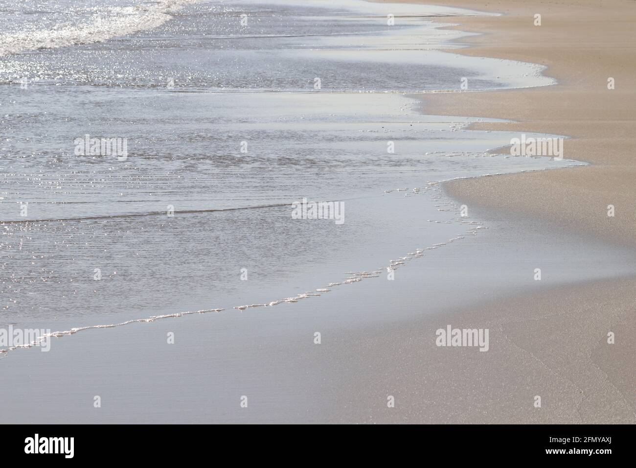 Patterns and textures in sand and sea Stock Photo - Alamy