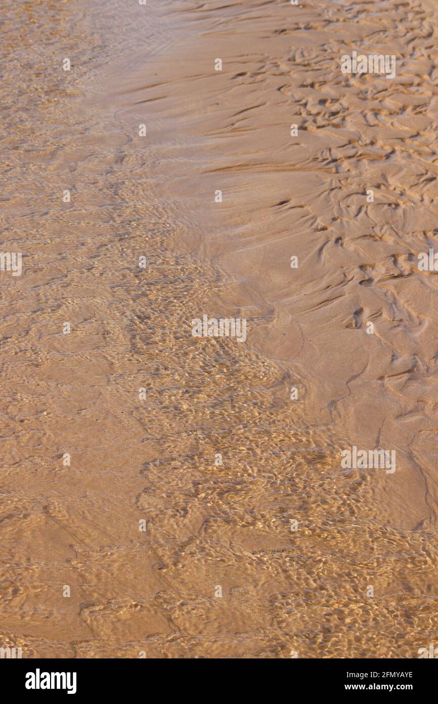 Patterns and textures in sand and sea Stock Photo - Alamy