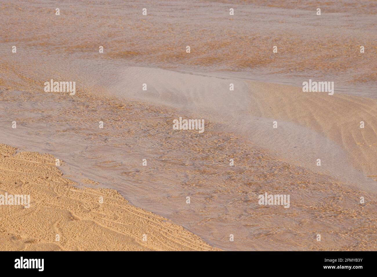 Patterns and textures in sand and sea Stock Photo - Alamy