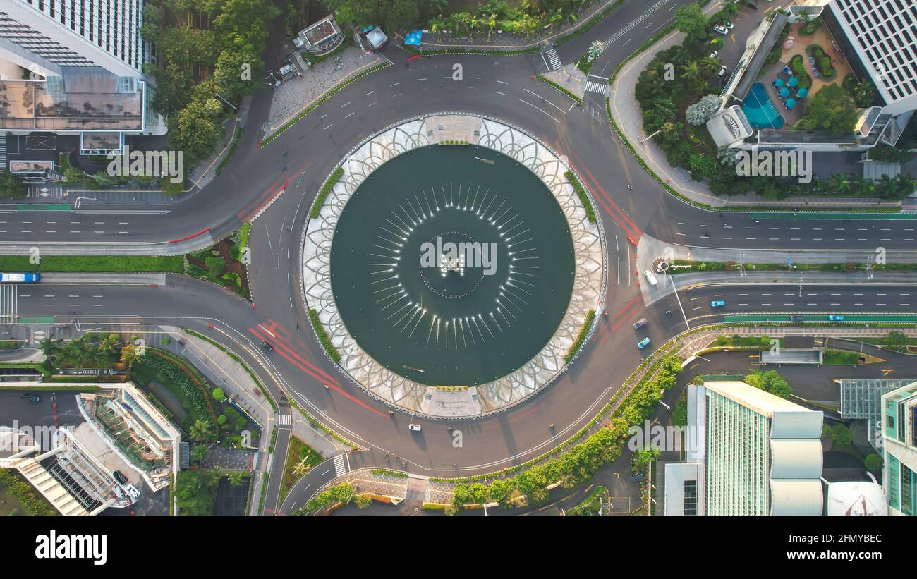 Aerial view of the city traffics at the Hotel Indonesia Roundabout ...