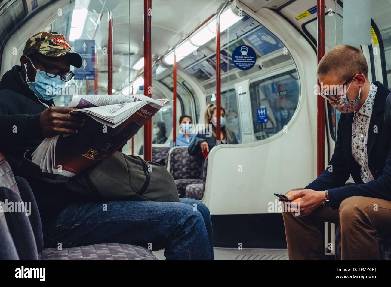 London, UK. 12th May 2021. Passengers on the London Underground wearing ...