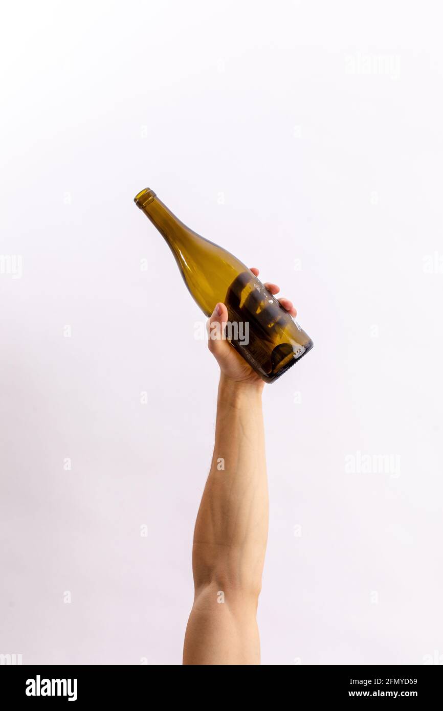 Hands hold trash on a light background. The concept of separate trash ...