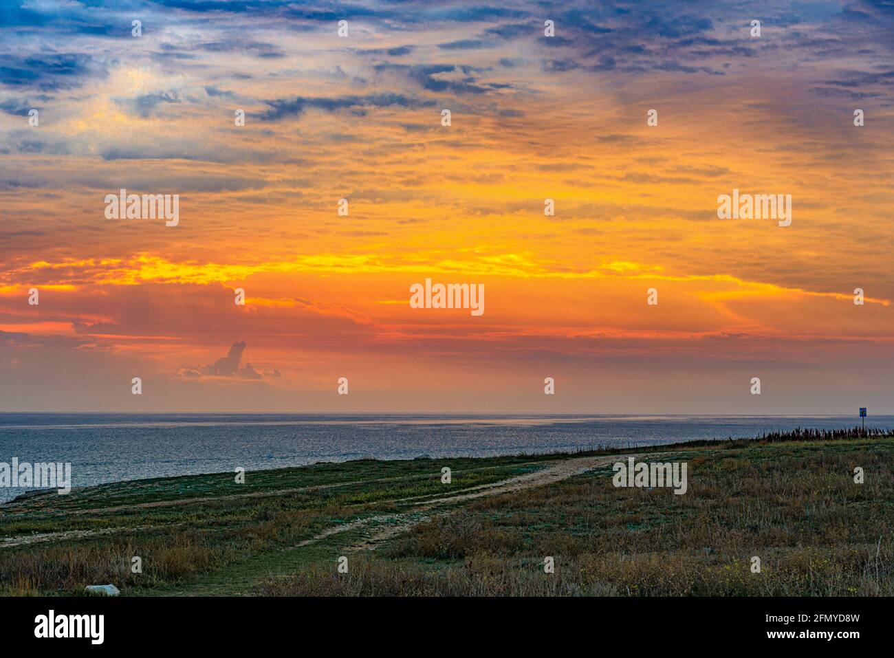 Landscape of the evening sky with the setting sun Stock Photo - Alamy