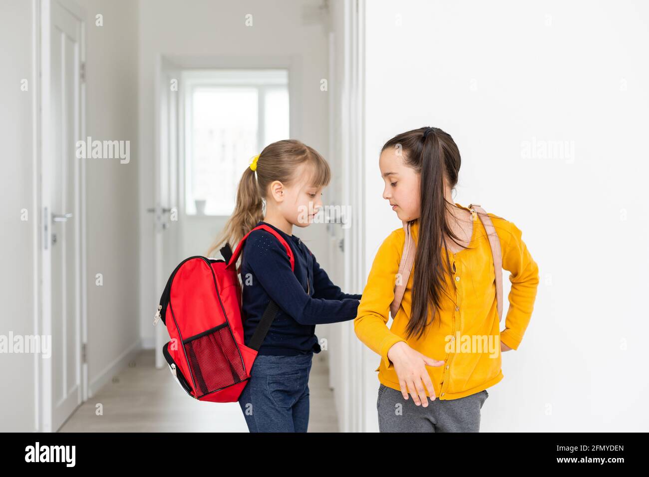 Two pupils of elementary school, Back to school Stock Photo - Alamy