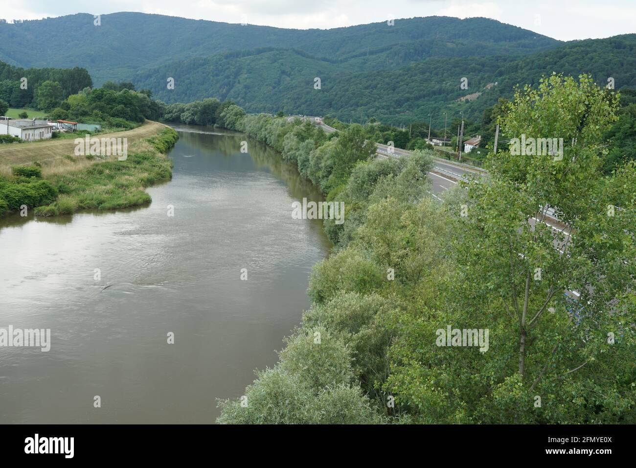 Hron river in Zarnovica region in central Slovakia with trees and ...
