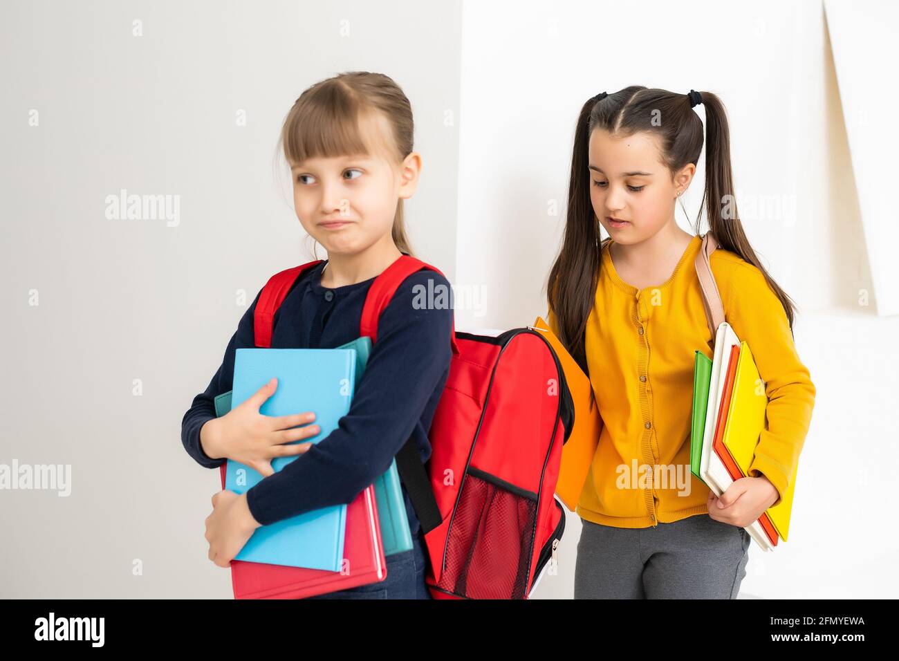 Two pupils of elementary school, Back to school Stock Photo - Alamy