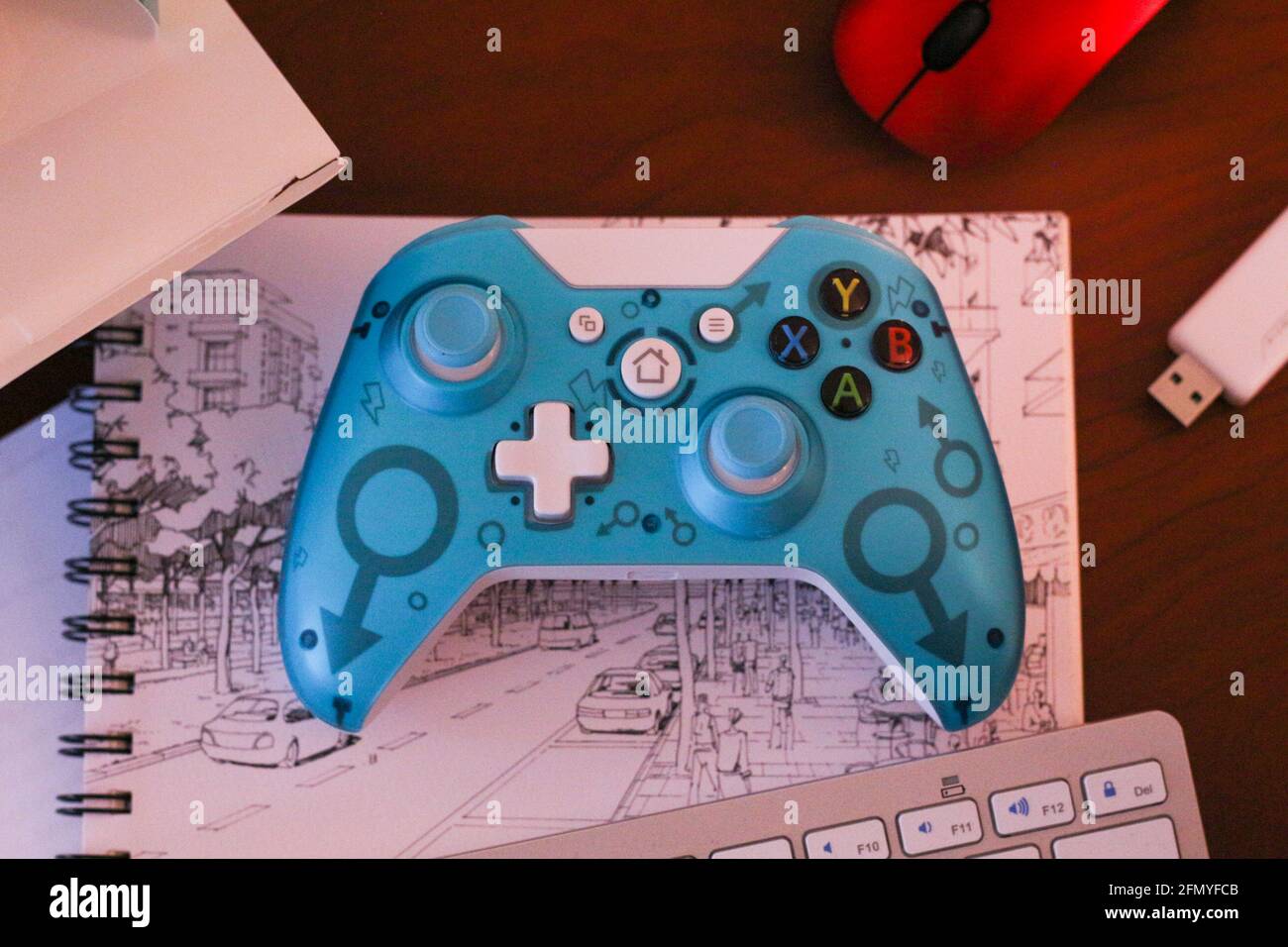 In this photo illustration, a generic controller for Microsoft Xbox 360 ...