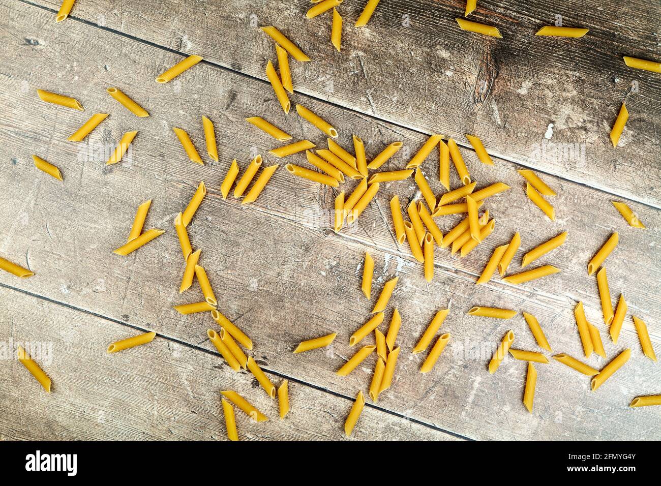 Flat lay overhead view of pasta shapes on a wooden table top Stock ...