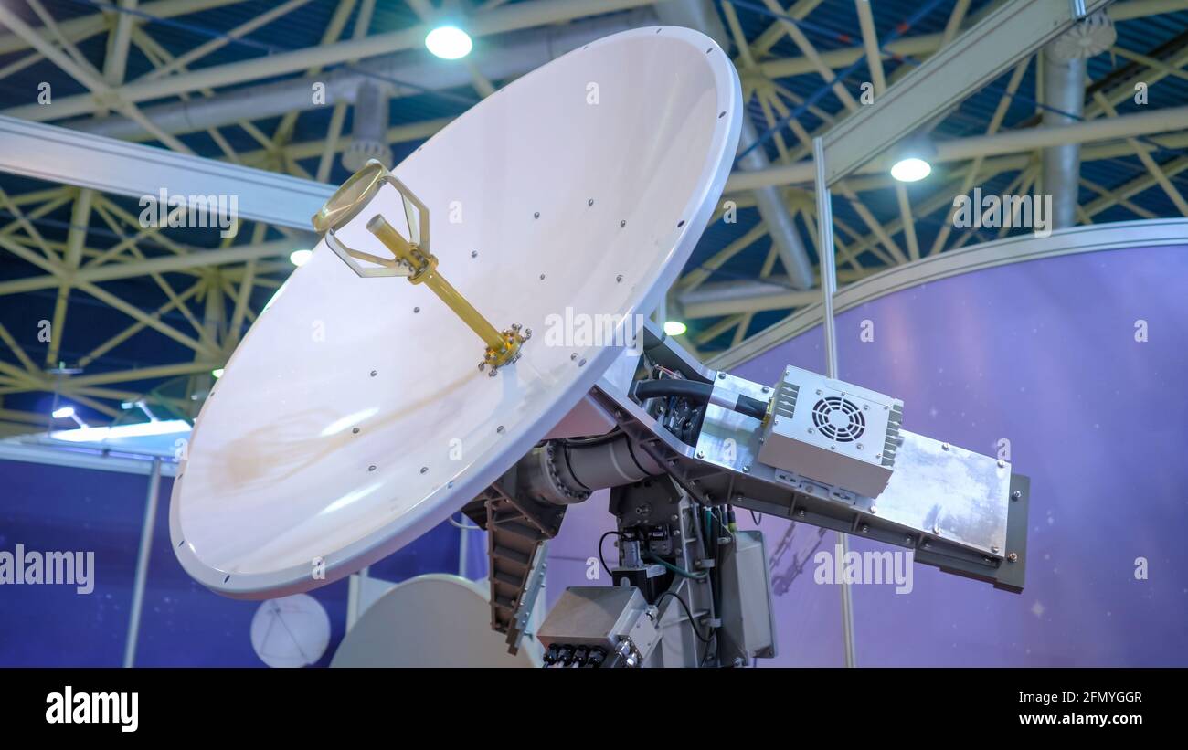 White rotating satellite dish antenna using to receive or transmit information Stock Photo - Alamy