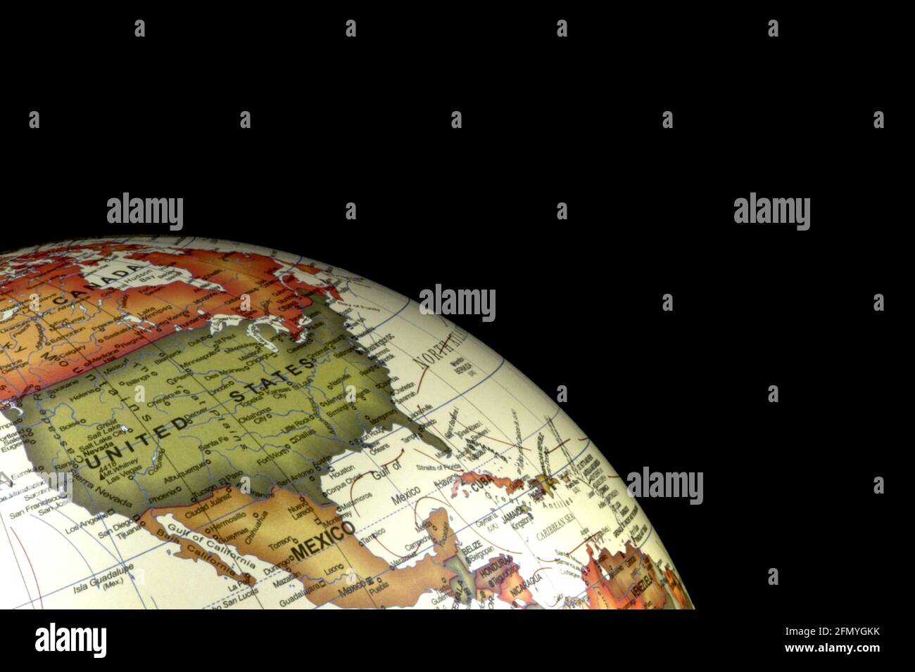 Segment of world globe map against a black background Stock Photo - Alamy