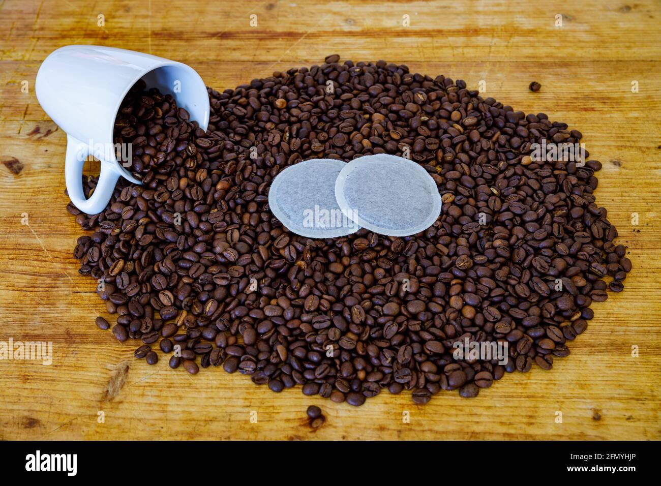 coffee beans and coffee pads Stock Photo - Alamy