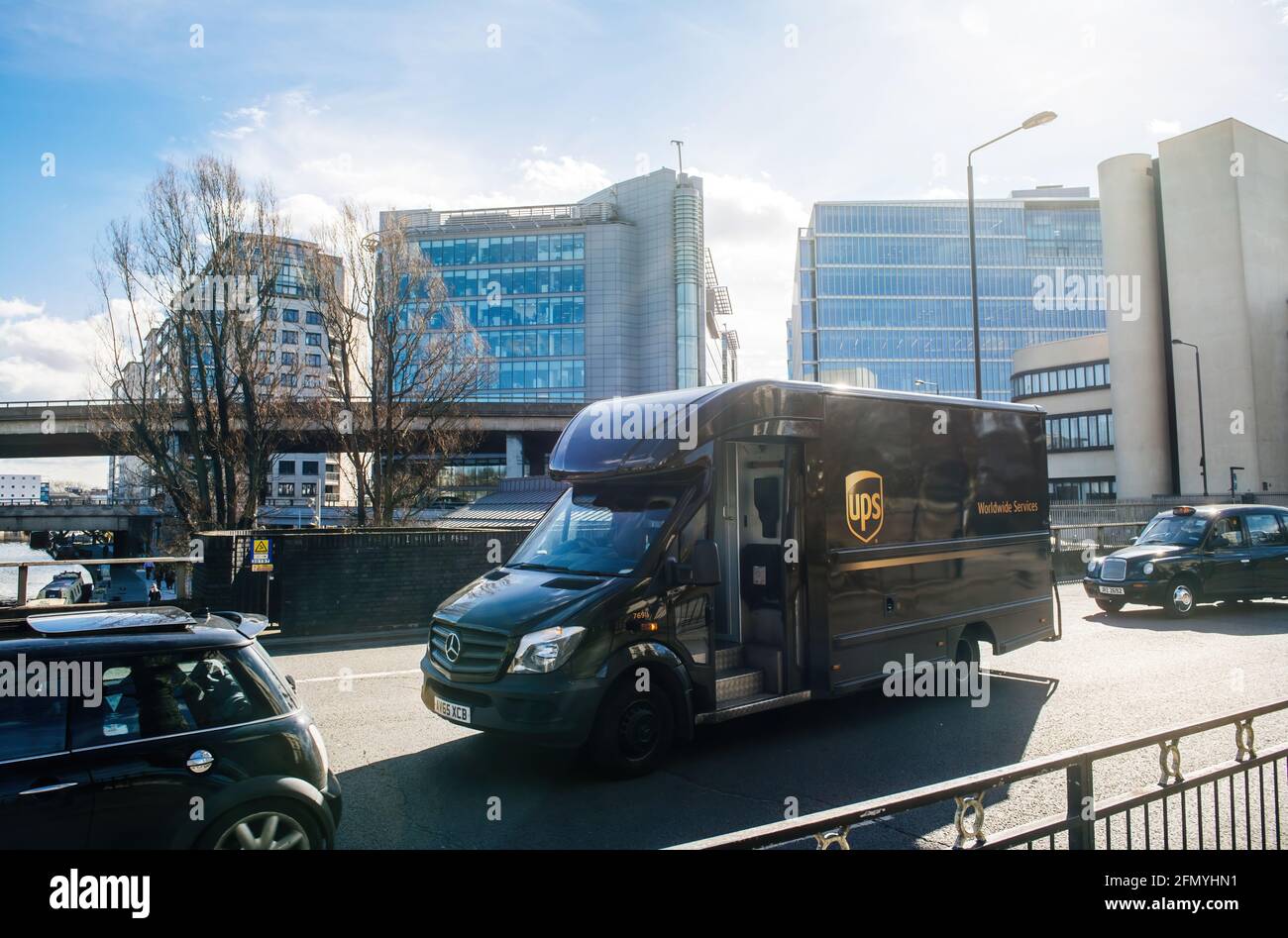 Rear view of Electric Vehicle UPS United Parcel Services postal ...